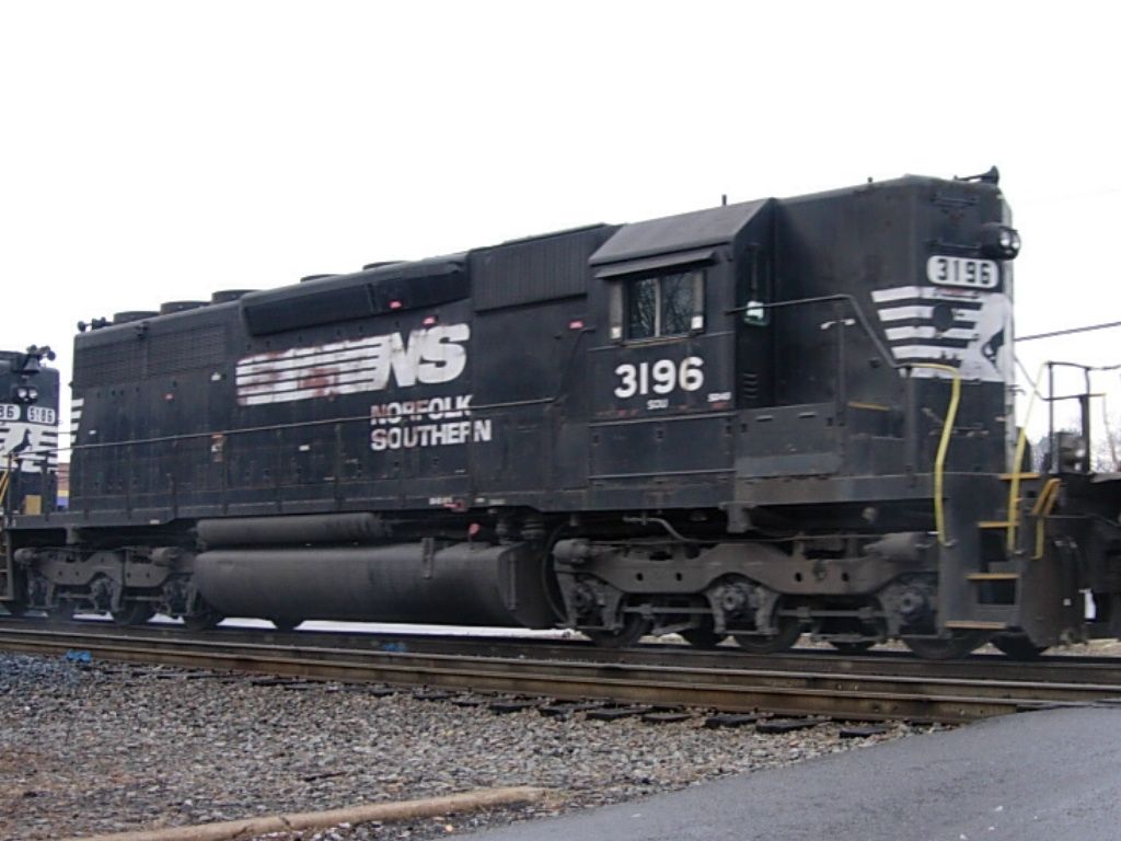 Straight SD40 passing through town